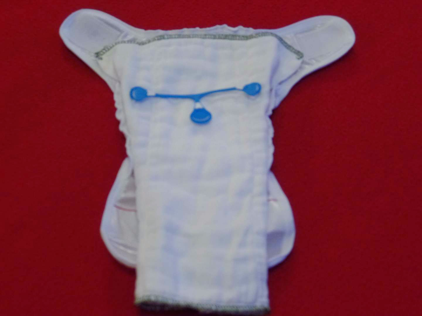 How to Use a Snappi - Mother Nature's Diaper Service