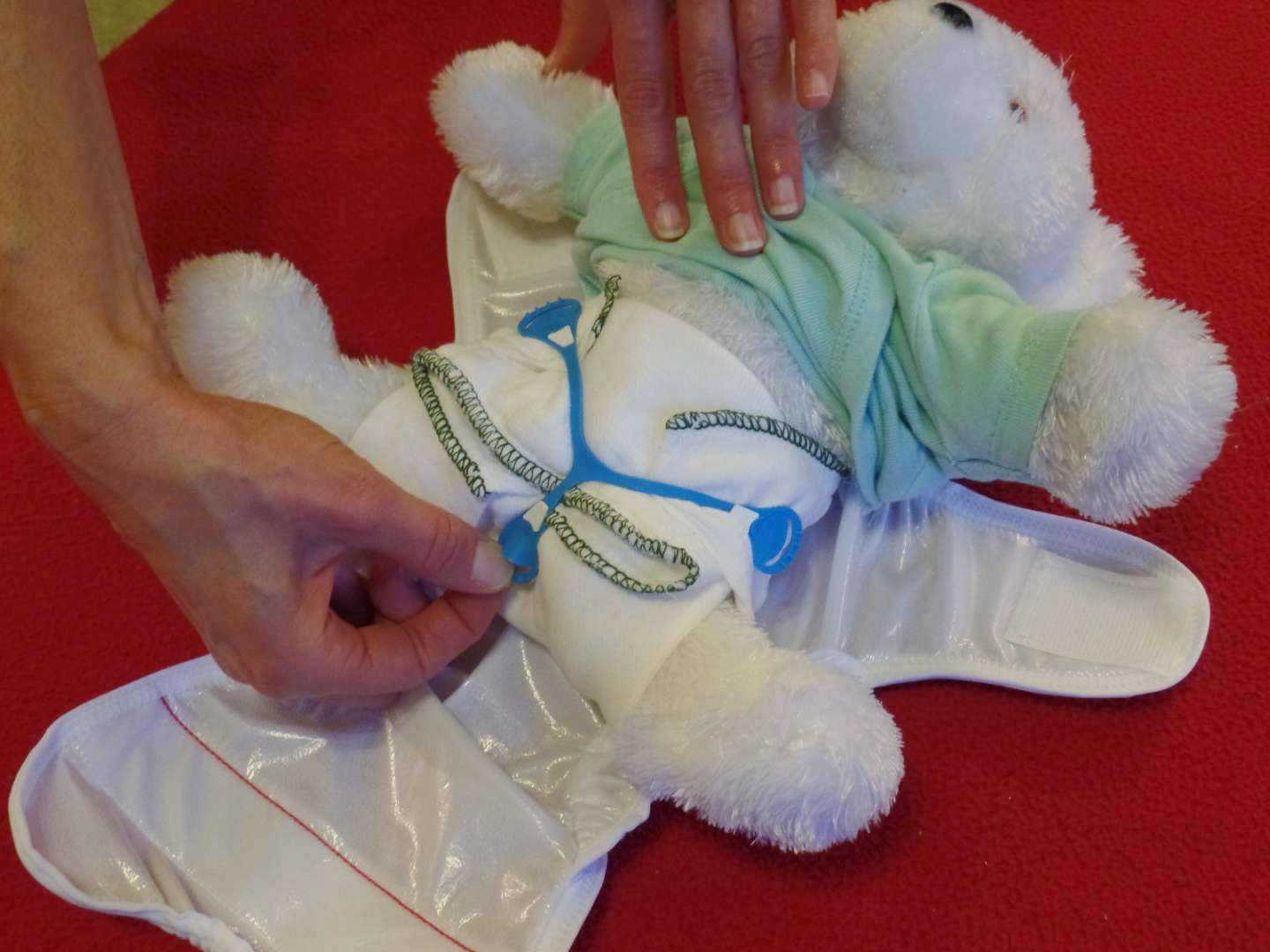 How to Use a Snappi - Mother Nature's Diaper Service