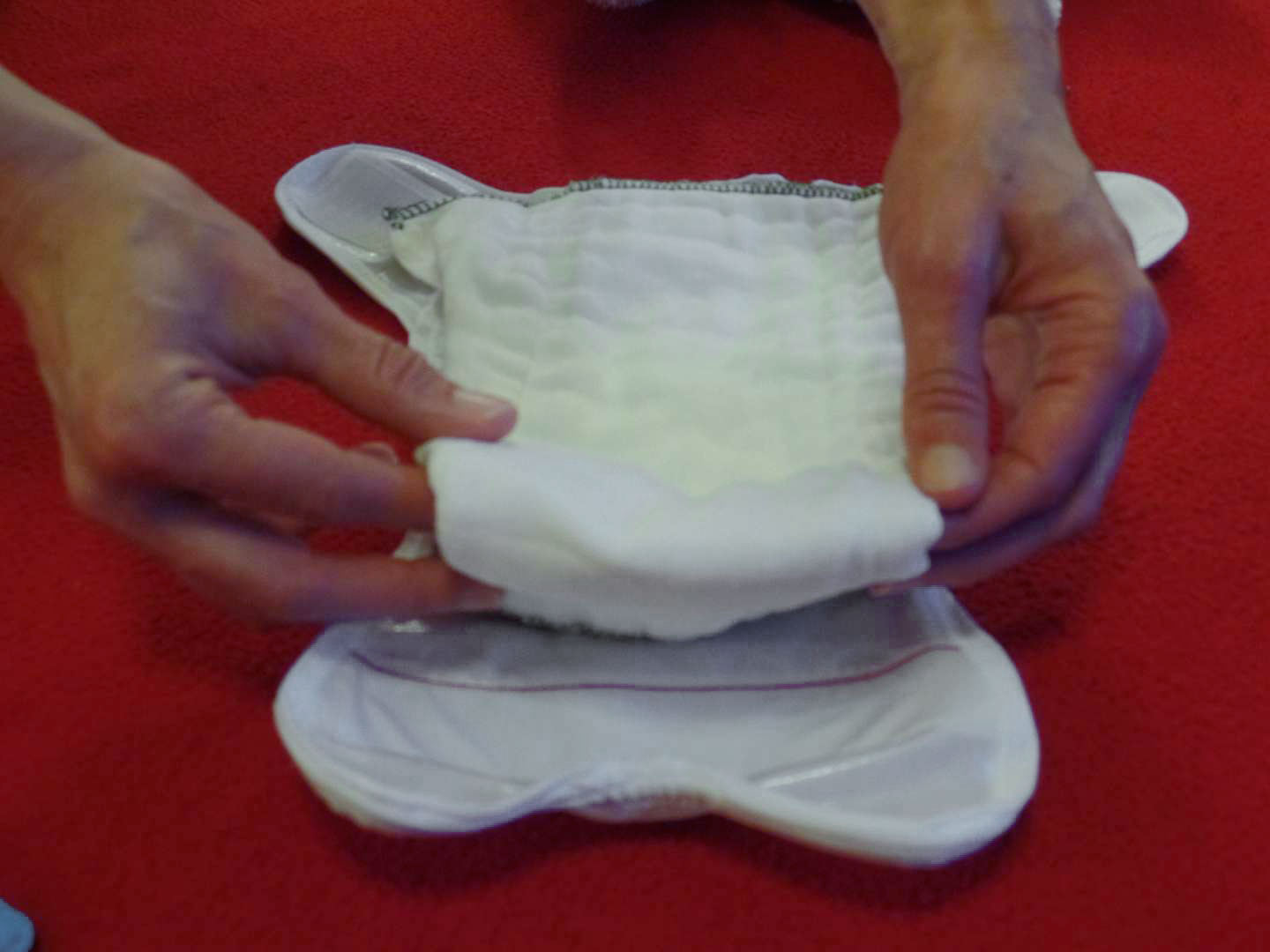 How to Use a Snappi - Mother Nature's Diaper Service