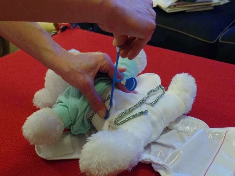 How to Use a Snappi - Mother Nature's Diaper Service