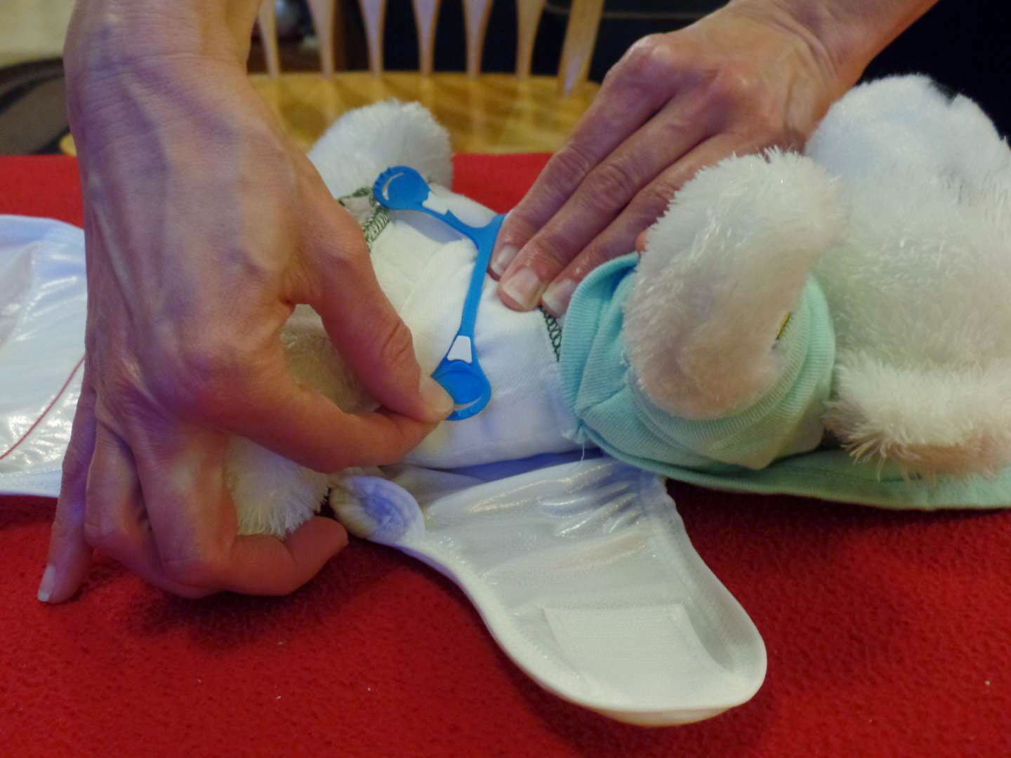 How to Use a Snappi - Mother Nature's Diaper Service